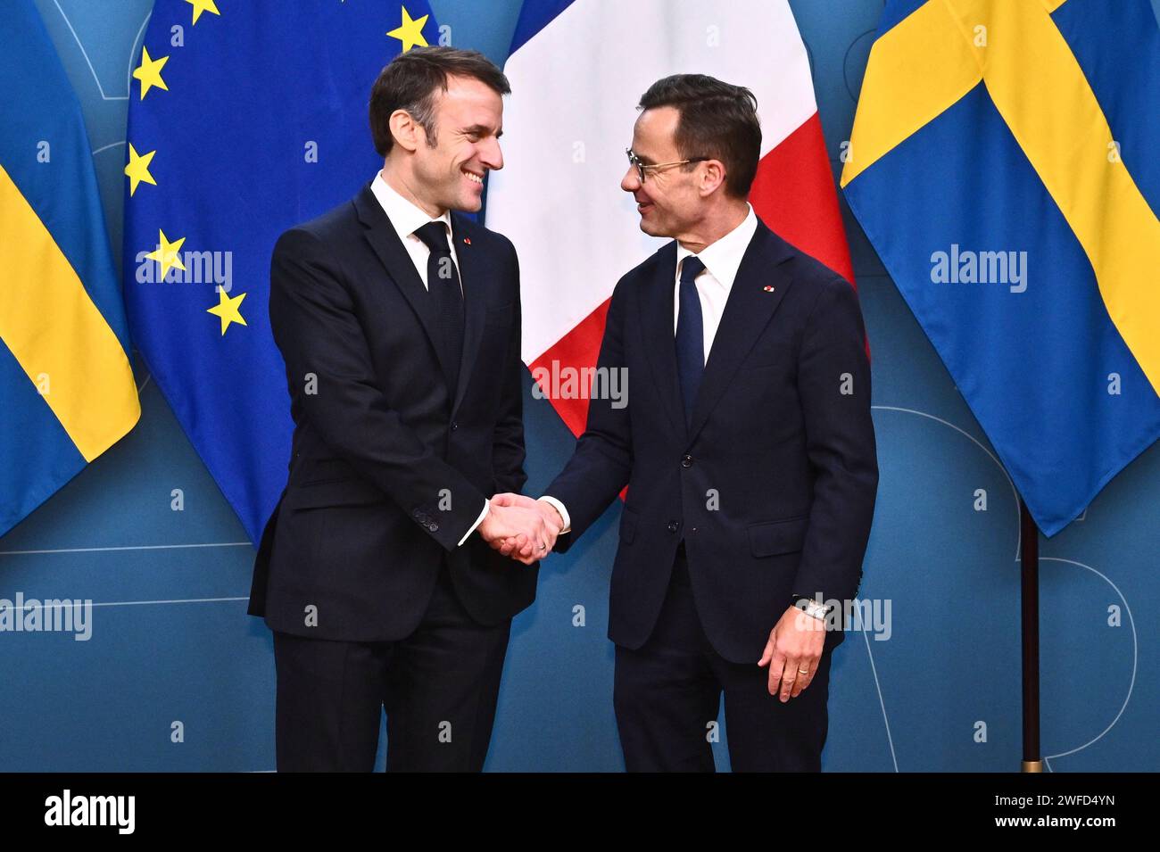 French President Emmanuel Macron, left, and Sweden's Prime Minister Ulf ...