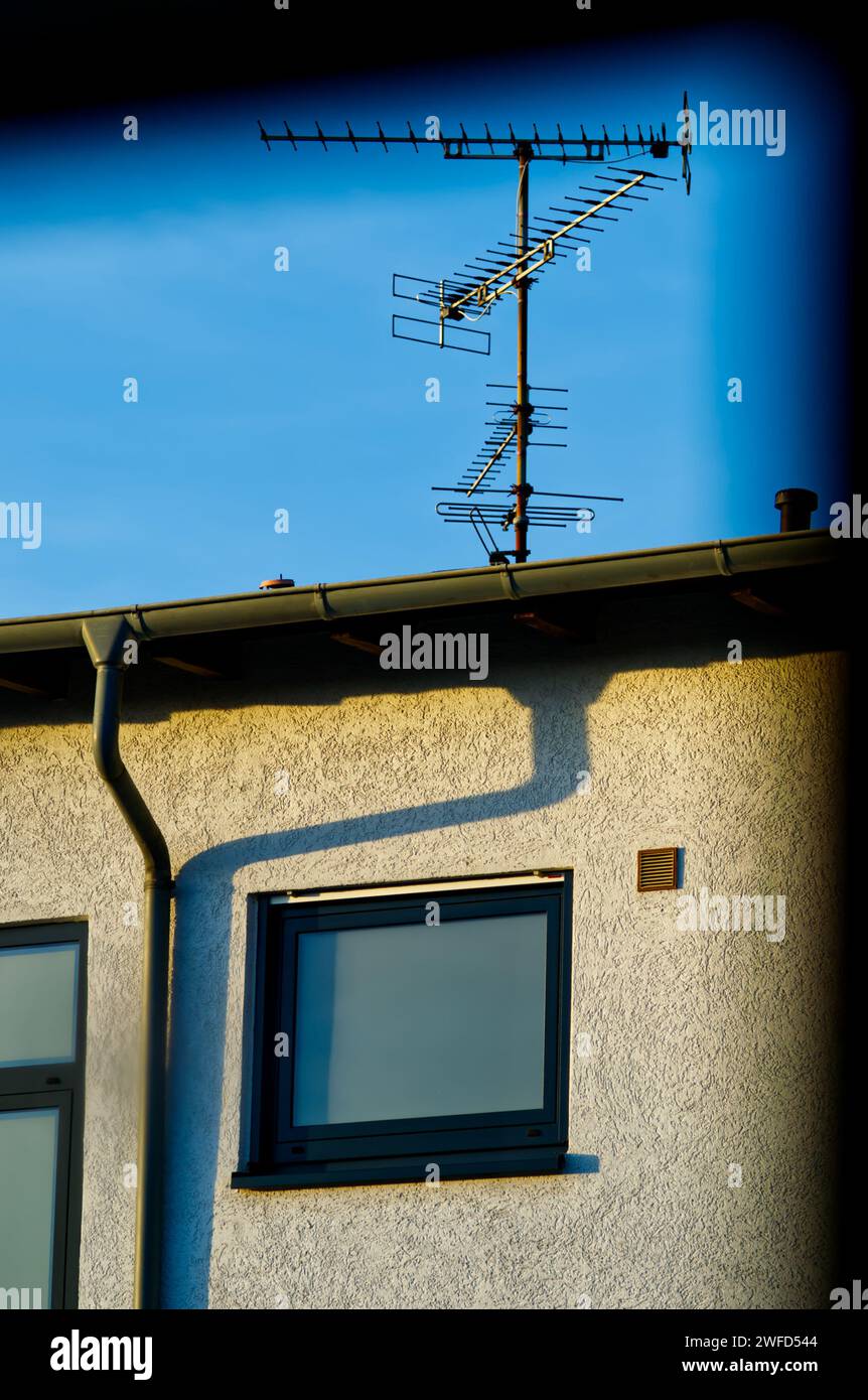 Retro style photograph with a window frame vignette showing a house ...