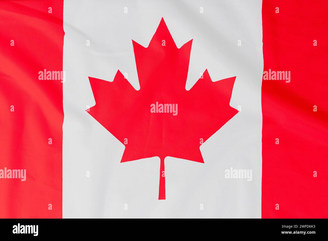 Flag of Canada with natural material creases as a background Stock ...