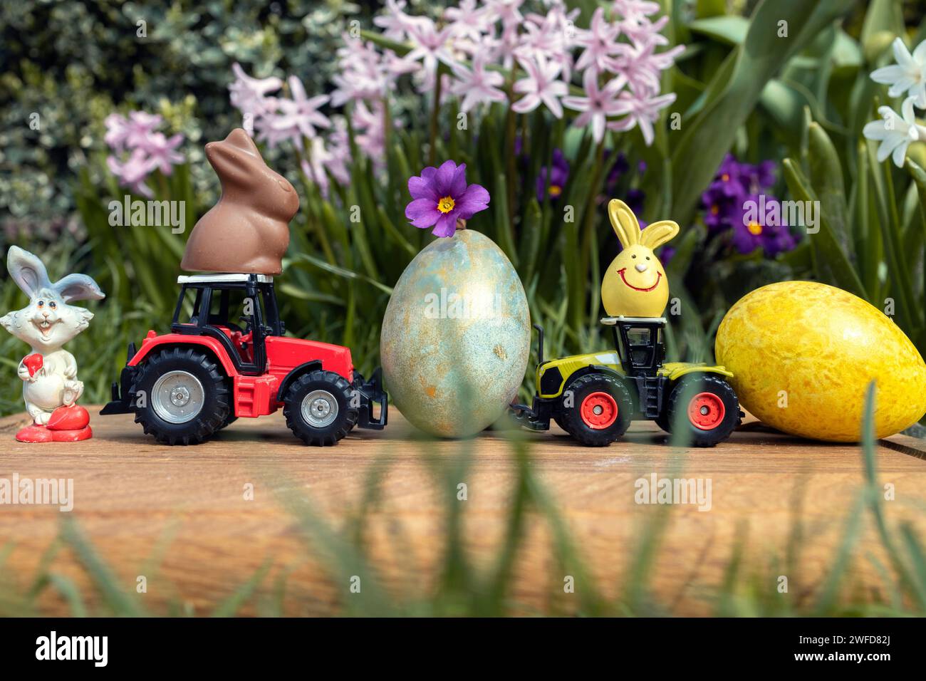 2 models of toy tractors, painted multi-colored eggs, chocolate and ...