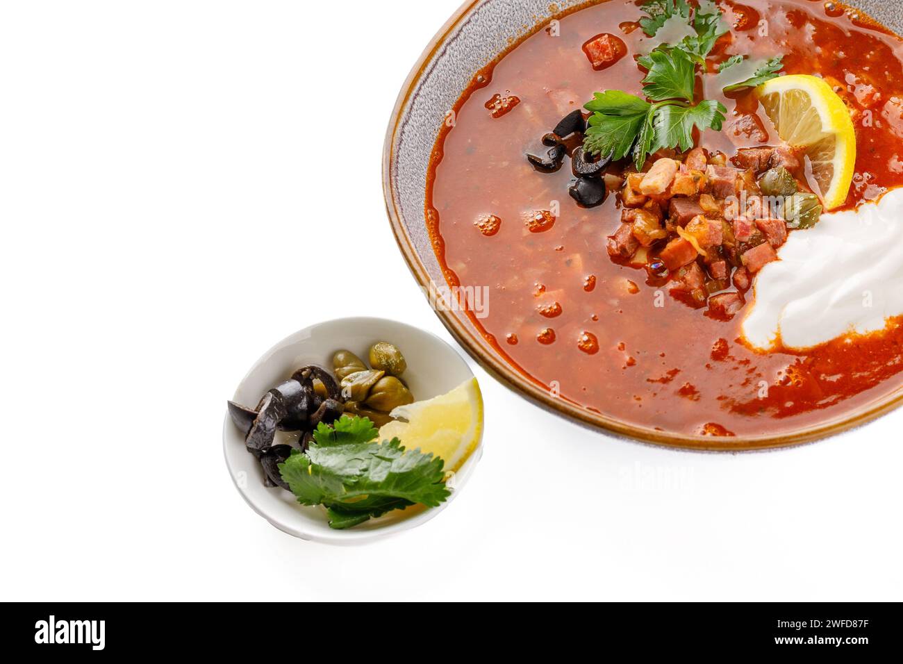 Meat solyanka on a white background studio shooting 1 Stock Photo - Alamy