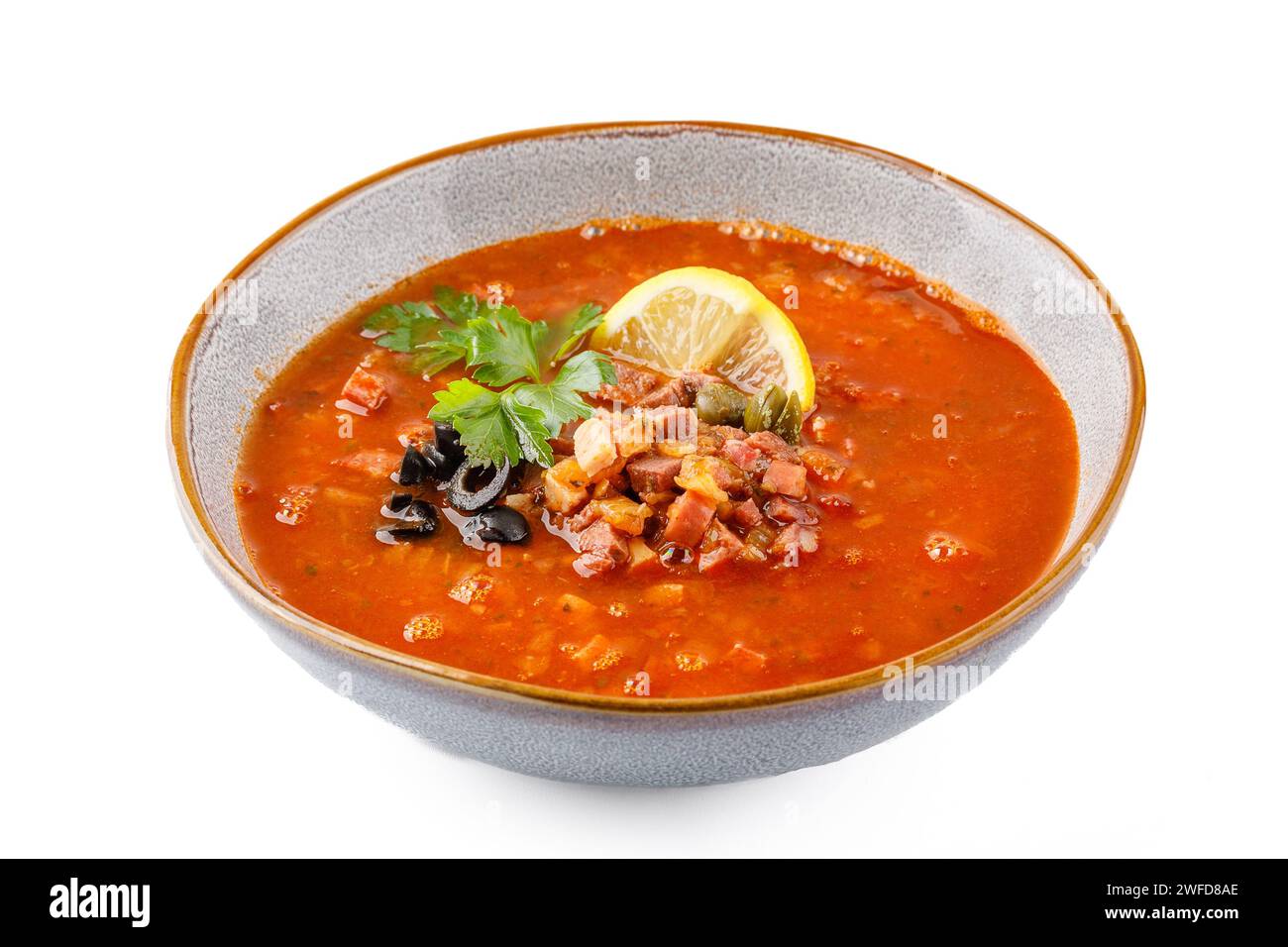 Meat solyanka on a white background studio shooting Stock Photo - Alamy