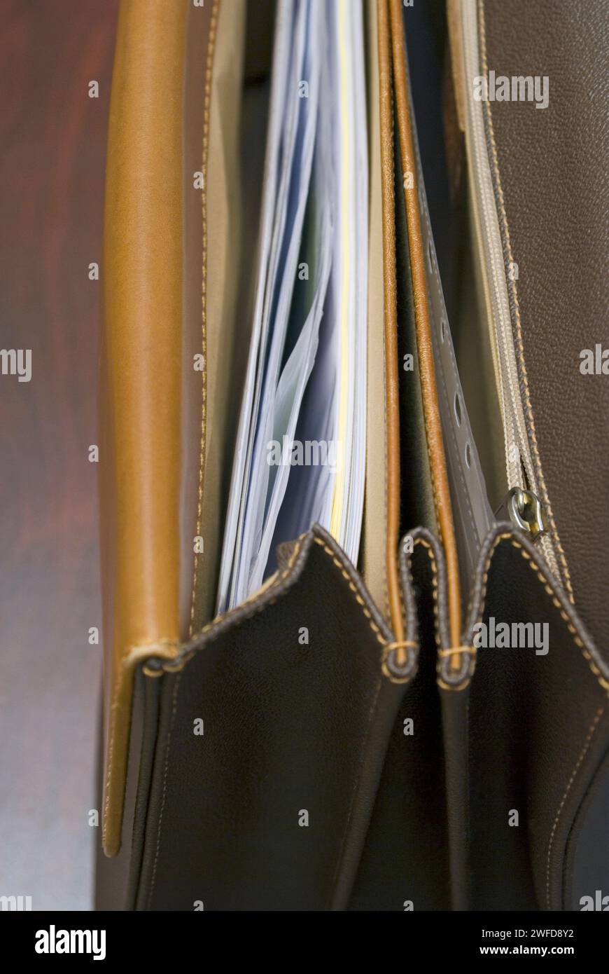 paper in the open briefcase Stock Photo - Alamy