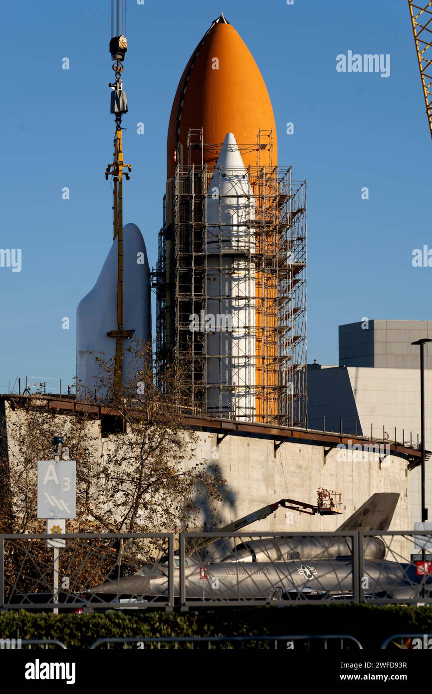 The Space Shuttle Endeavour is seen standing stacked with the fuel ...