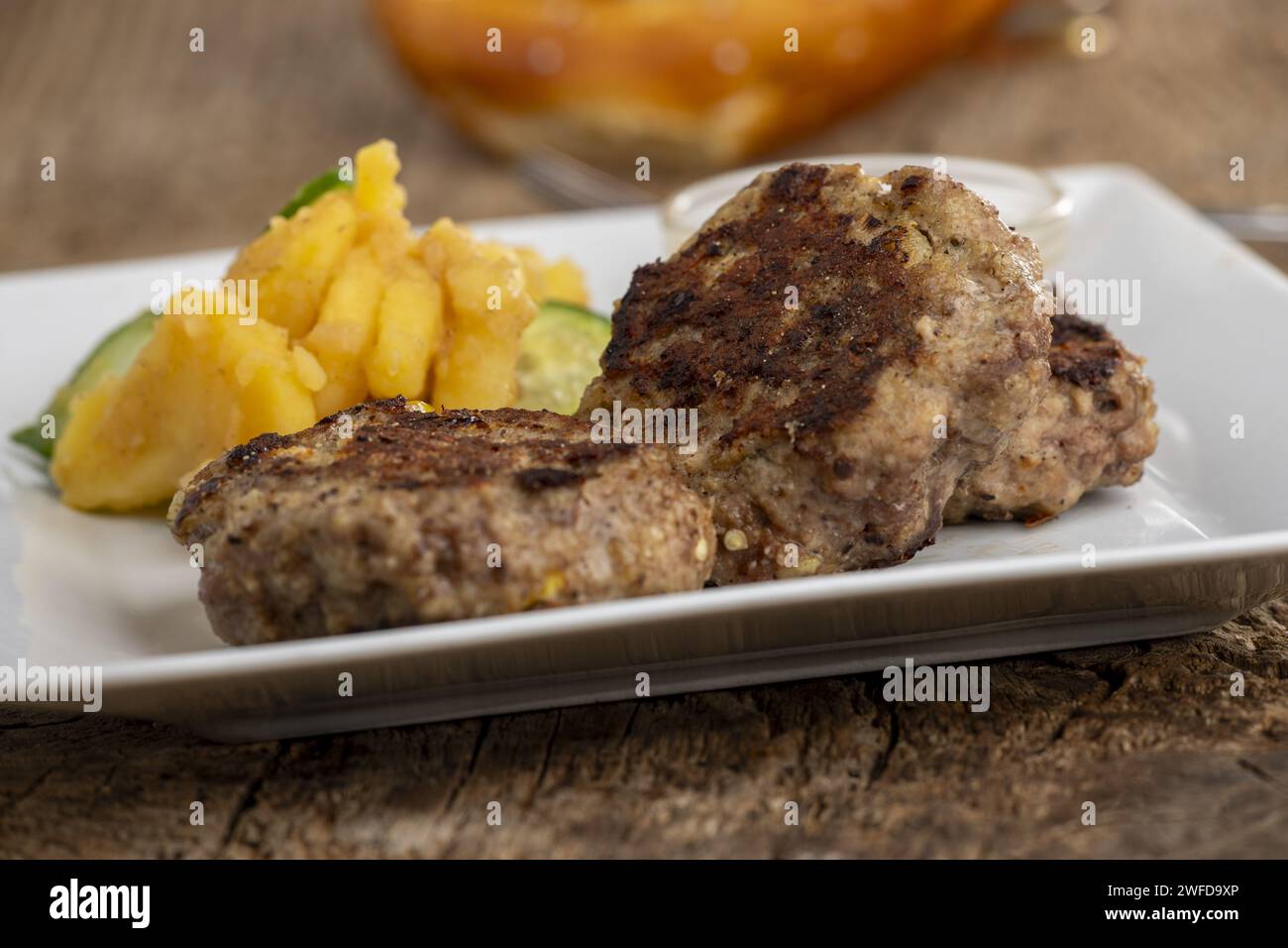Bavarian Meat Plants With Potato Salad Stock Photo - Alamy
