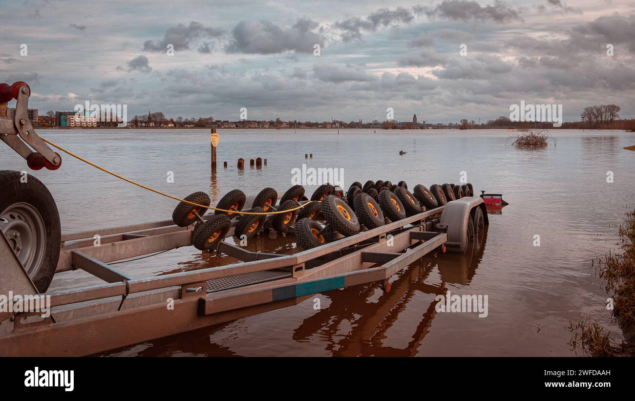 The boat trailer is removed from the water before it is completely ...