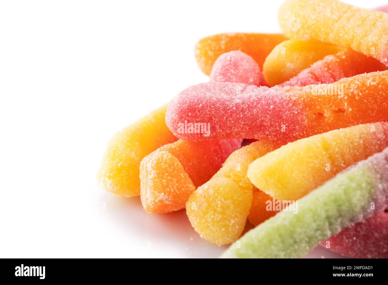 Colorful jelly worms in sugar isolated on a white background. Gummy ...