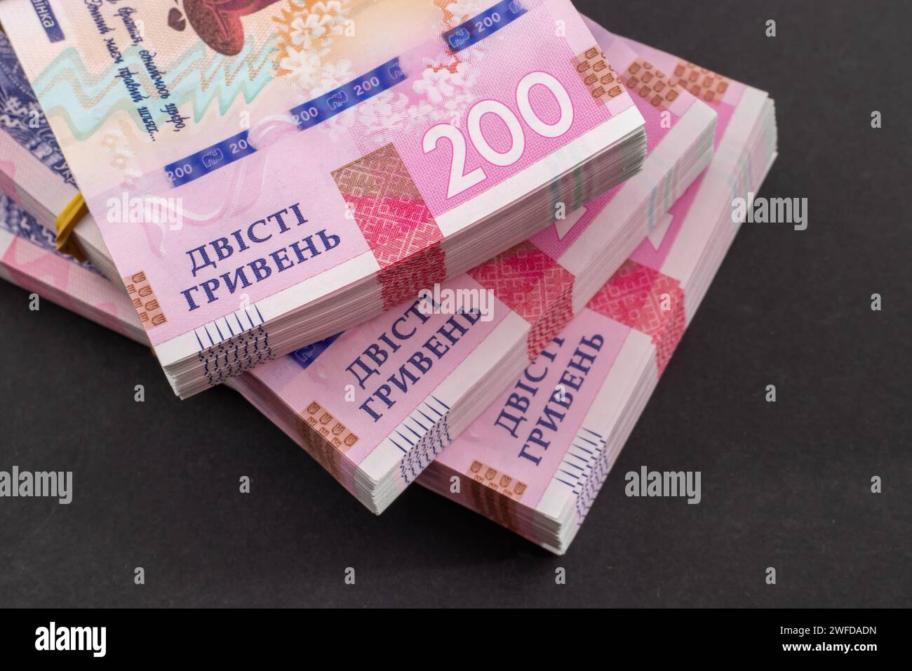 Stack of ukrainian money hryvnia. grivna, hryvna with 200 banknotes ...