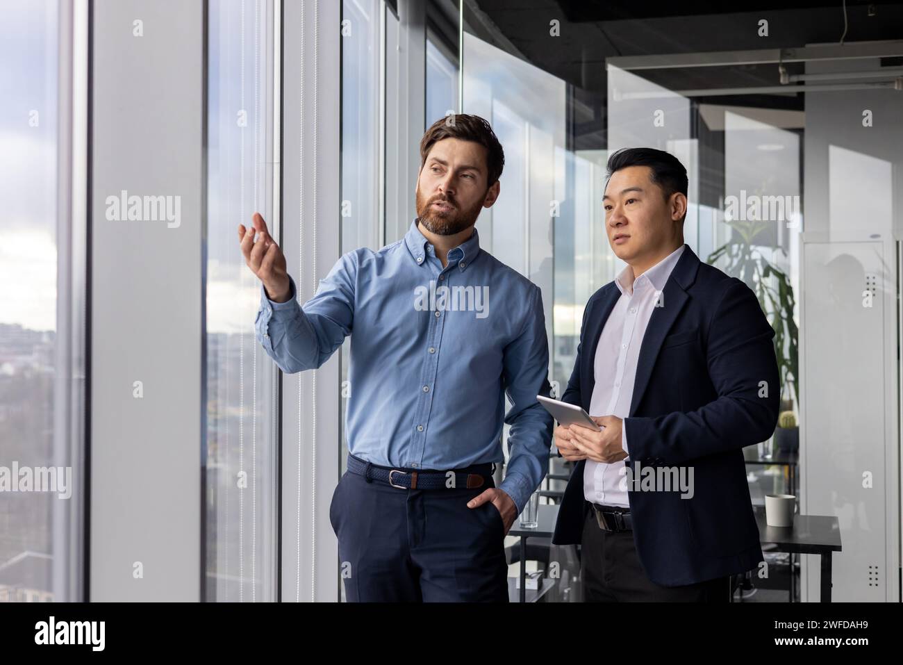 Two male professionals engage hi-res stock photography and images - Alamy