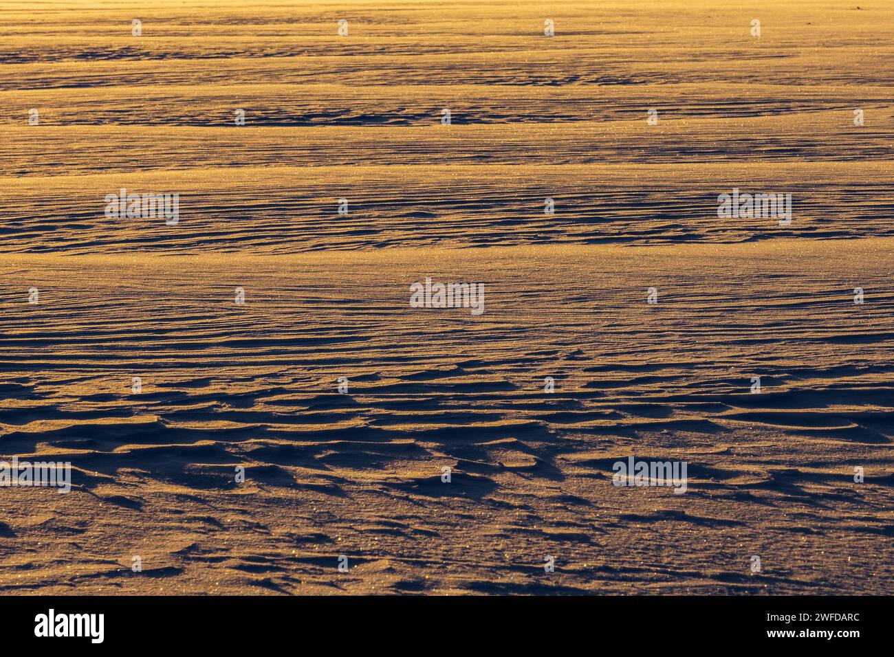 Snow patterns made by blowing wind Stock Photo - Alamy