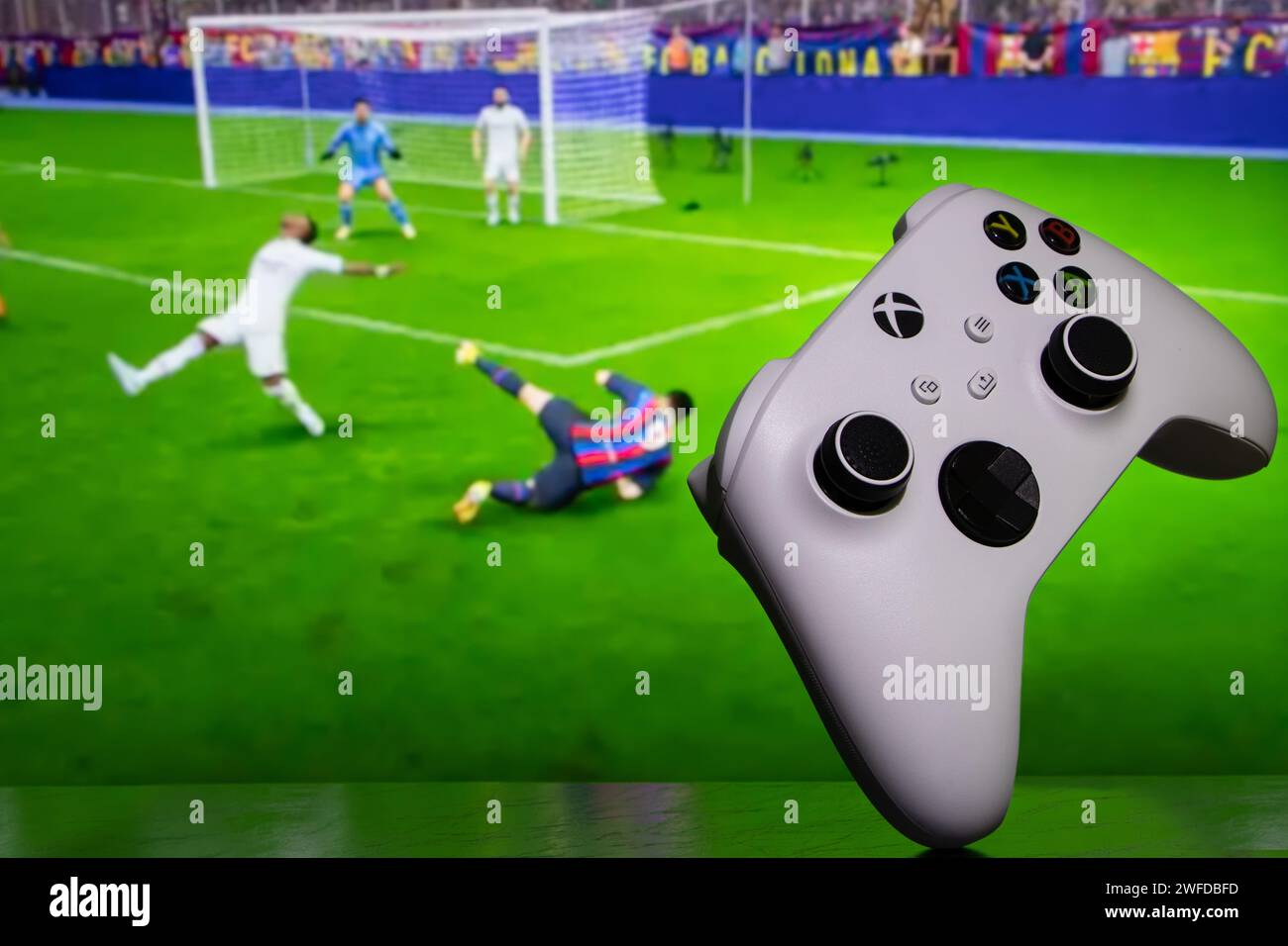 Dnipro, Ukraine, 28 september 2023: EA FC 24 with xbox controller on TV ...