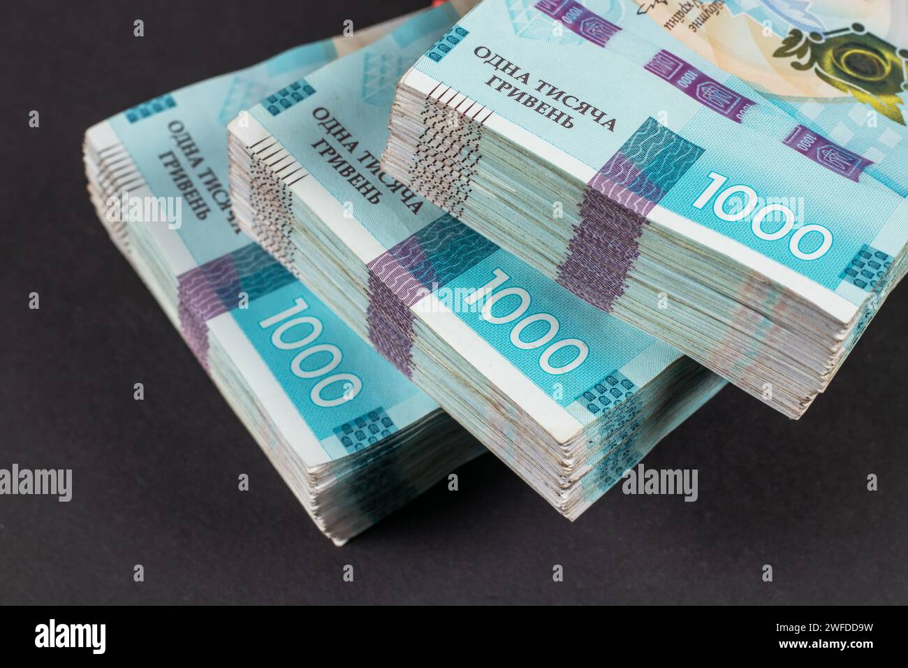 Stack of ukrainian money hryvnia. grivna, hryvna with 1000 banknotes ...