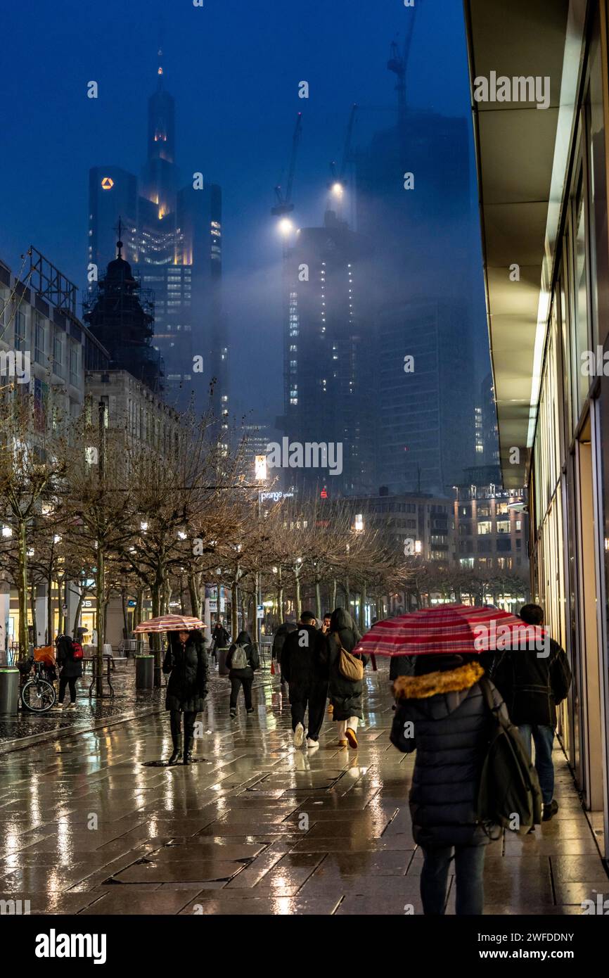 Rainy weather, freezing rain, pedestrian zone Zeil, shopping street ...
