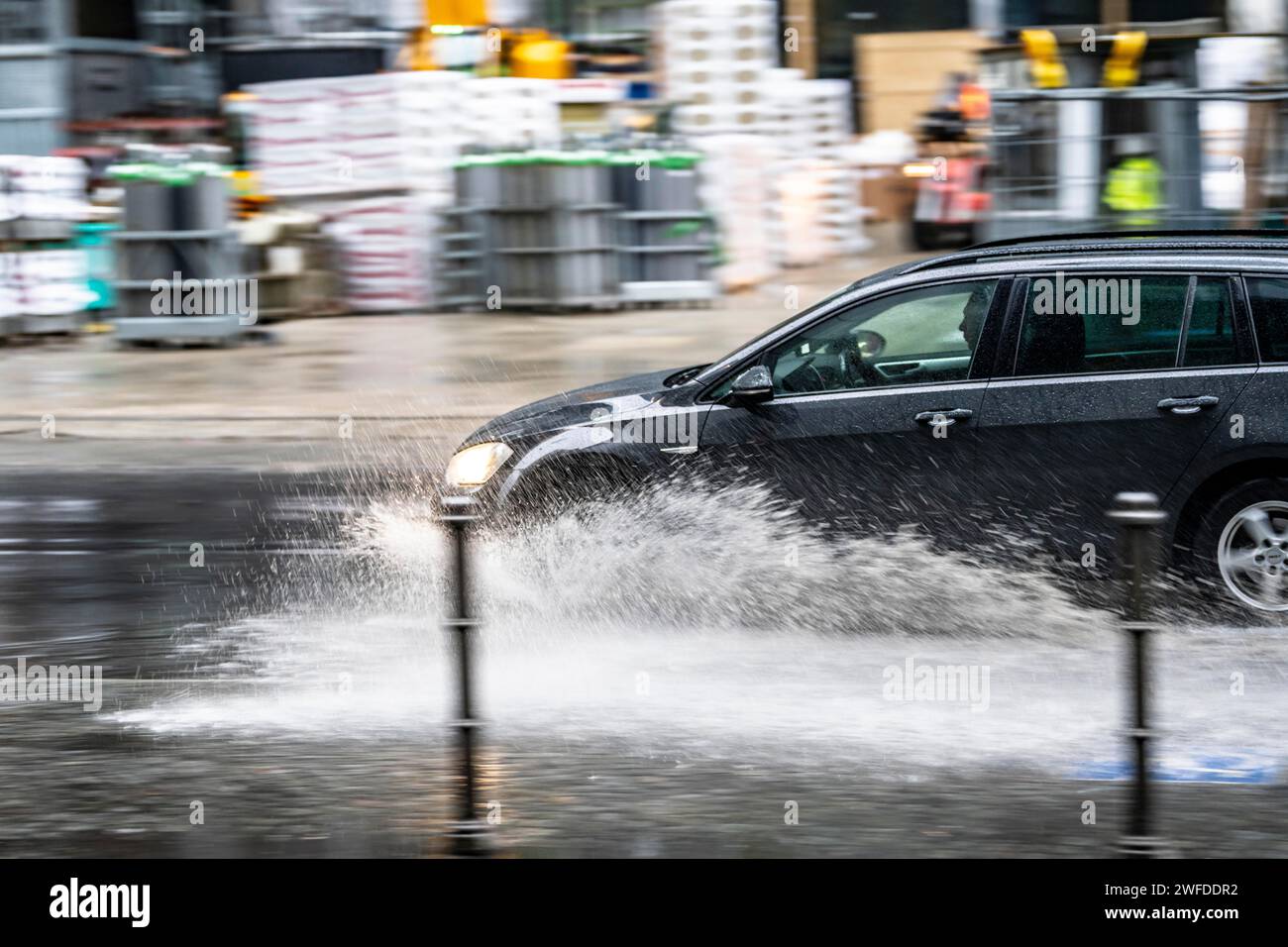 Winter, rainy weather, freezing rain, large puddle, puddle of water, in ...