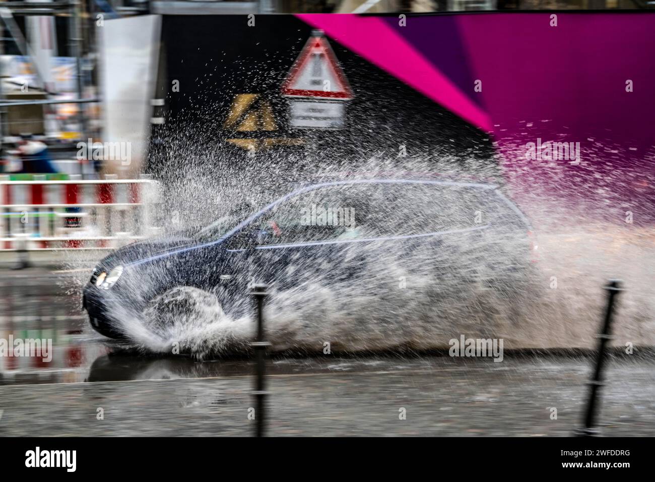 Winter, rainy weather, freezing rain, large puddle, puddle of water, in ...