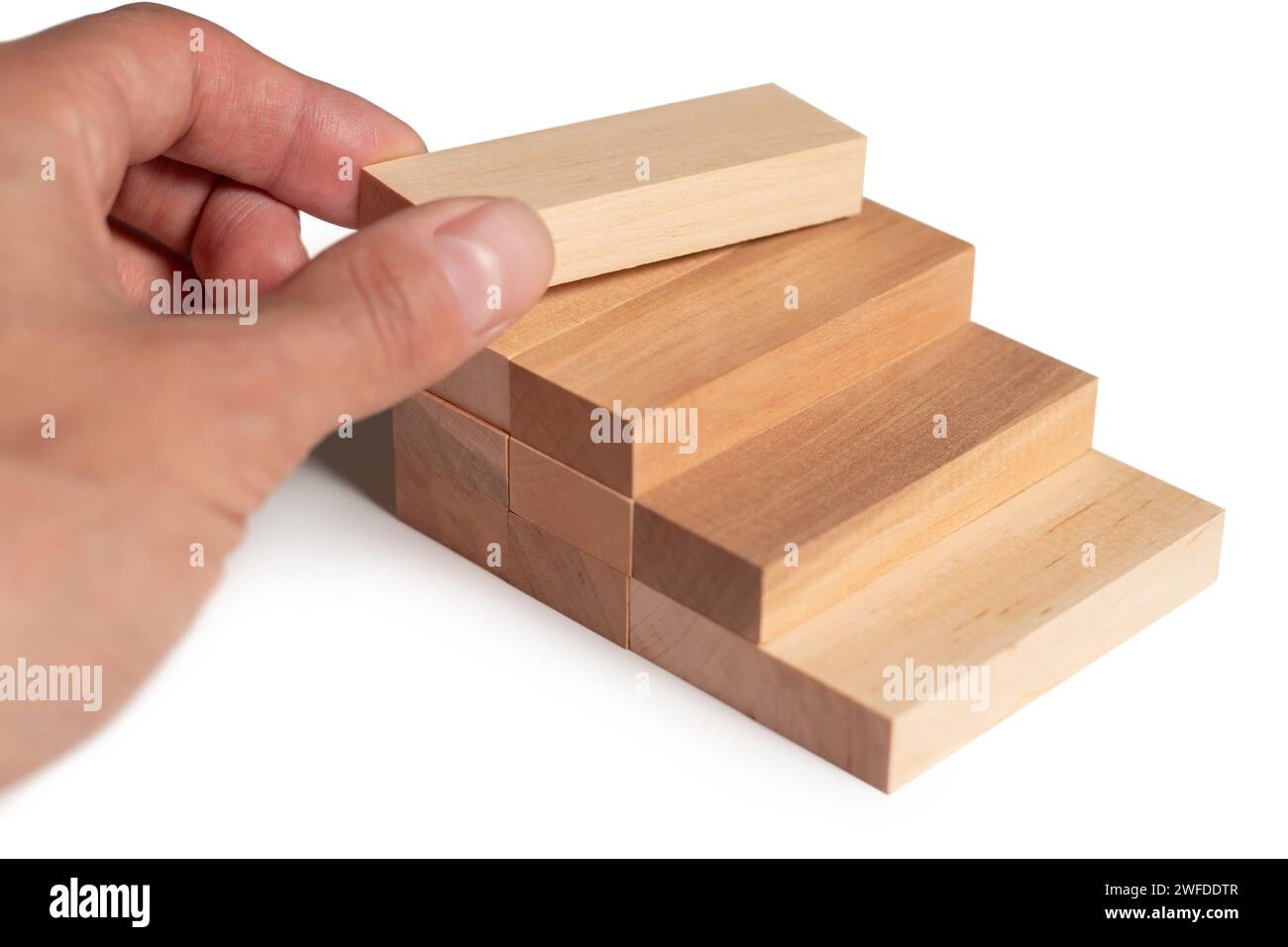 Business man build blocks hi-res stock photography and images - Alamy