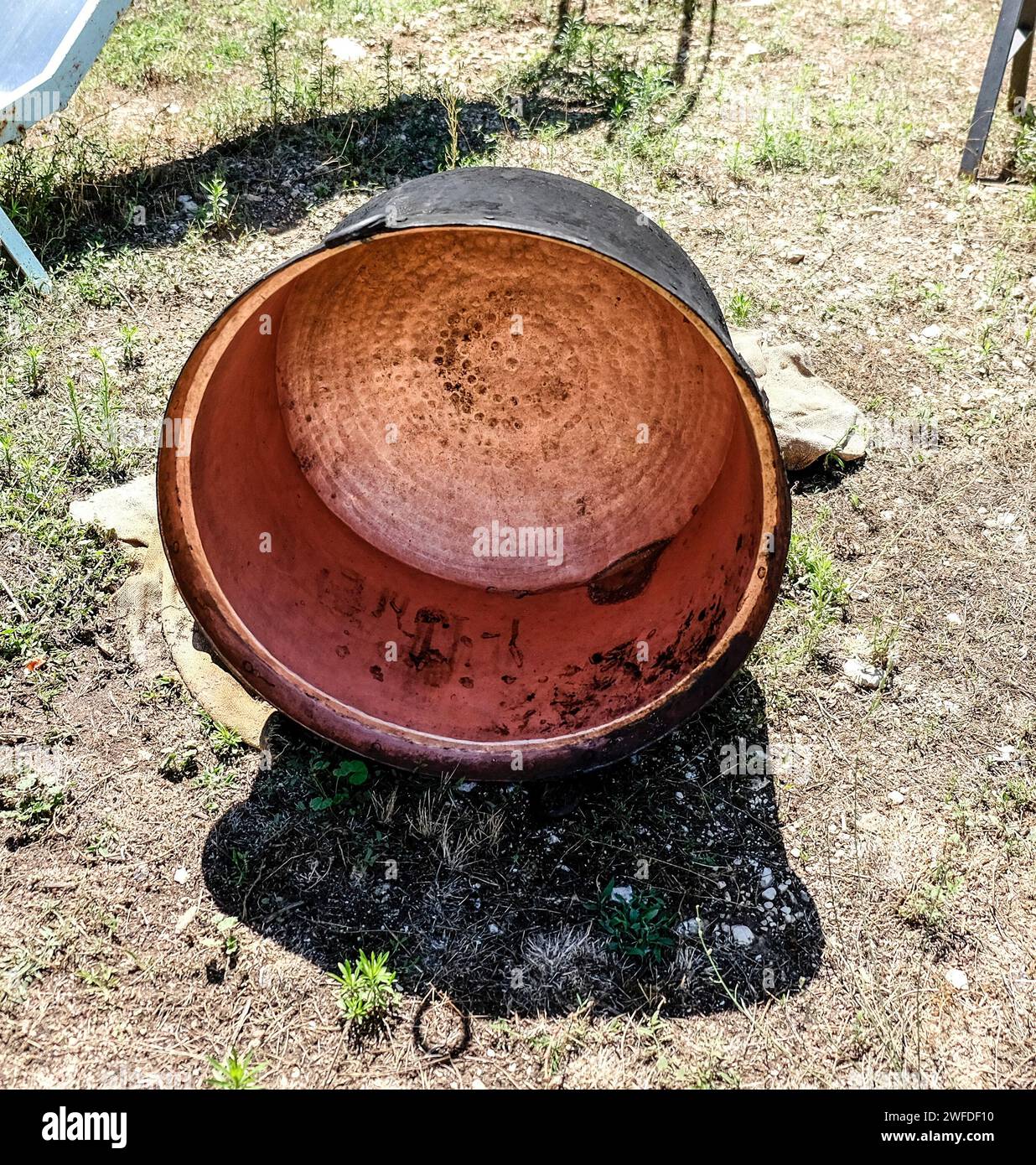 large copper cauldron for cooking on a wood fire. High quality photo ...