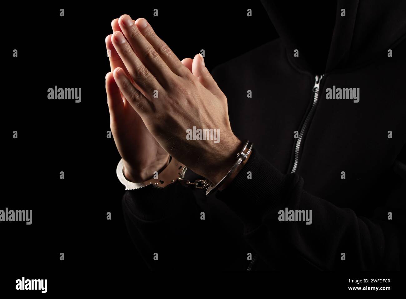 Woman handcuffs behind back hi-res stock photography and images - Alamy