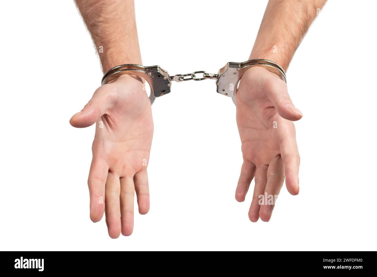Man's hands in handcuffs on a white background, isolated Stock Photo ...