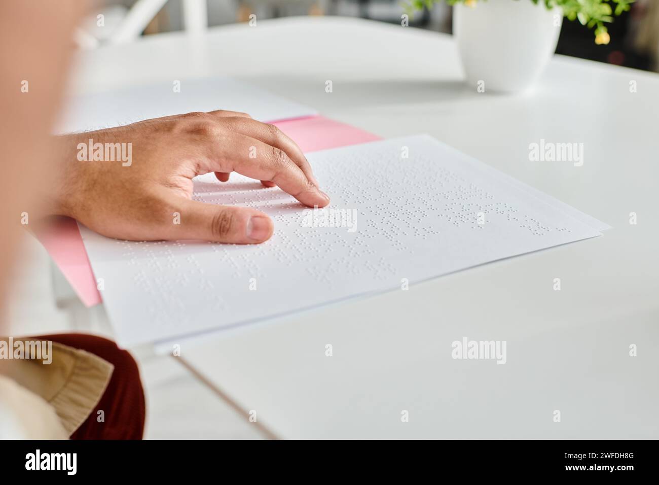 cropped view of indian man with visual impairment in casual cozy attire ...