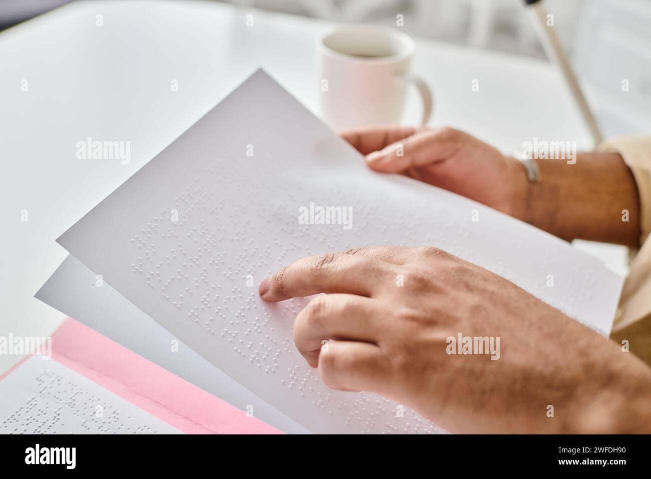 cropped view of indian blind man in casual attire with walking stick ...