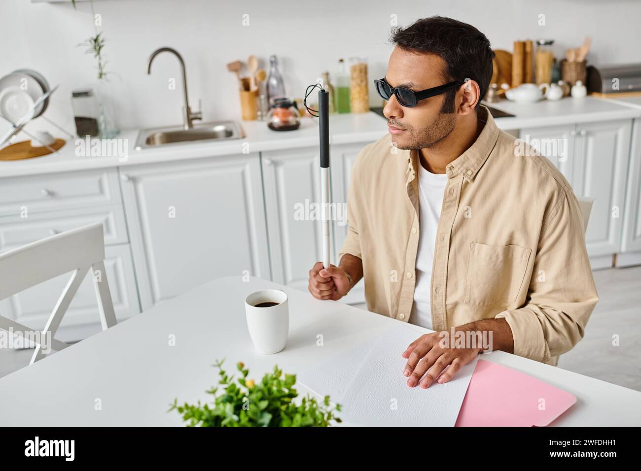 handsome indian blind man in cozy attire with glasses and walking stick ...