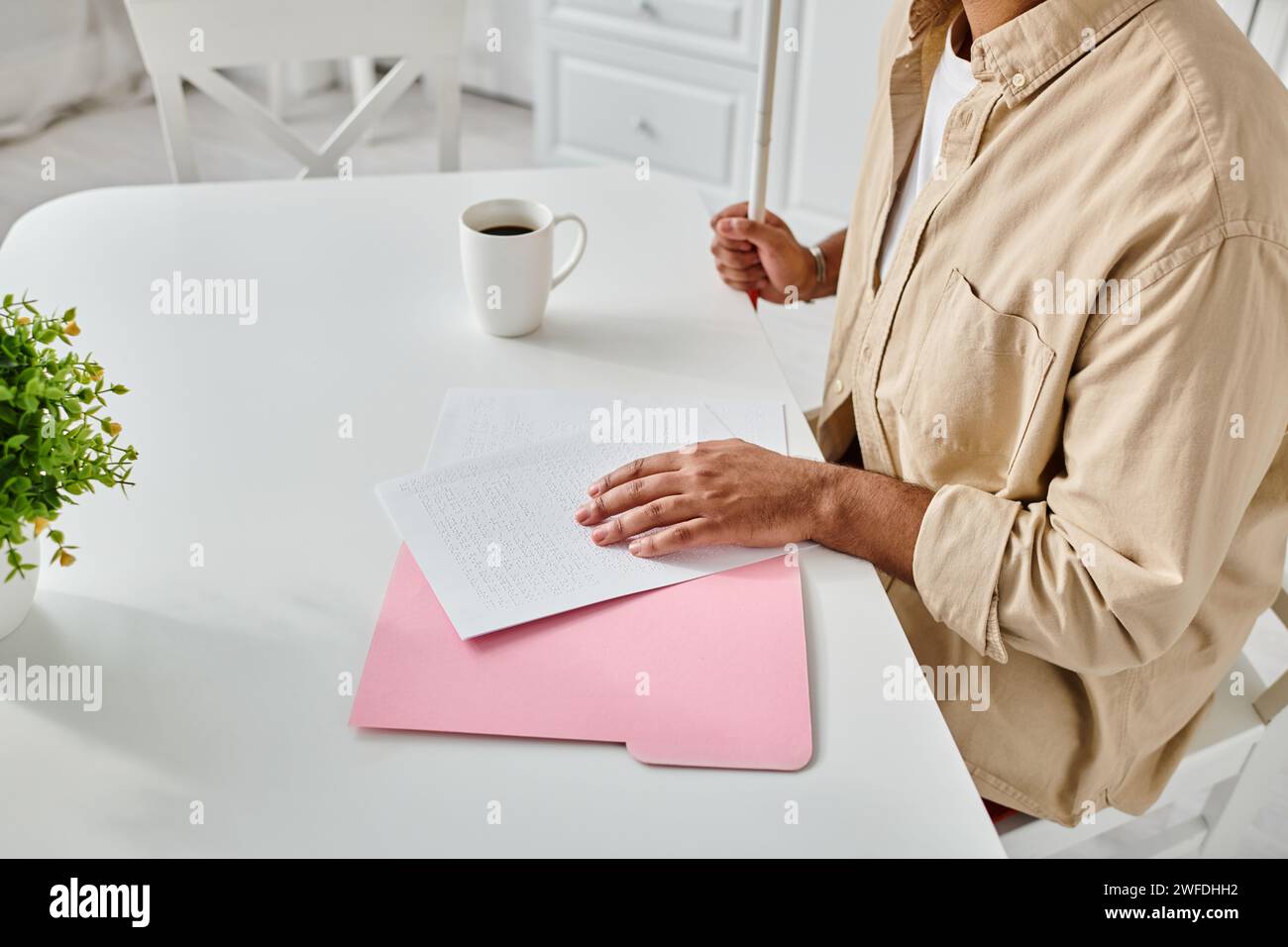 cropped view of indian blind man in casual attire with walking stick ...