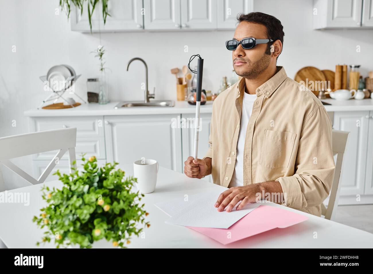 good looking indian blind man in cozy attire with glasses and walking ...