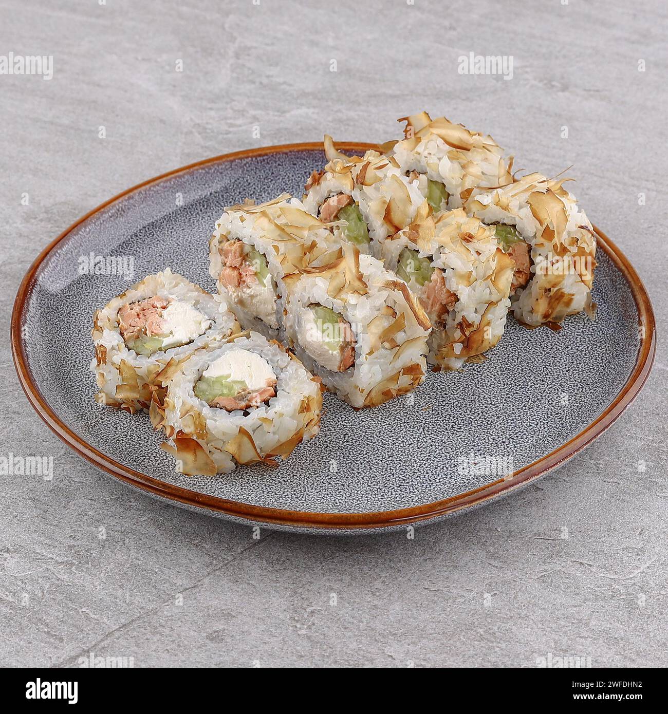 Roll Bonito on a stone background, studio shooting Stock Photo - Alamy