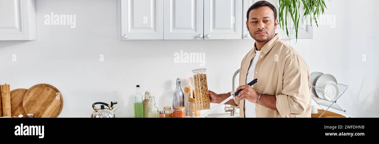 handsome indian man with blindness in casual outfit picking jar of ...