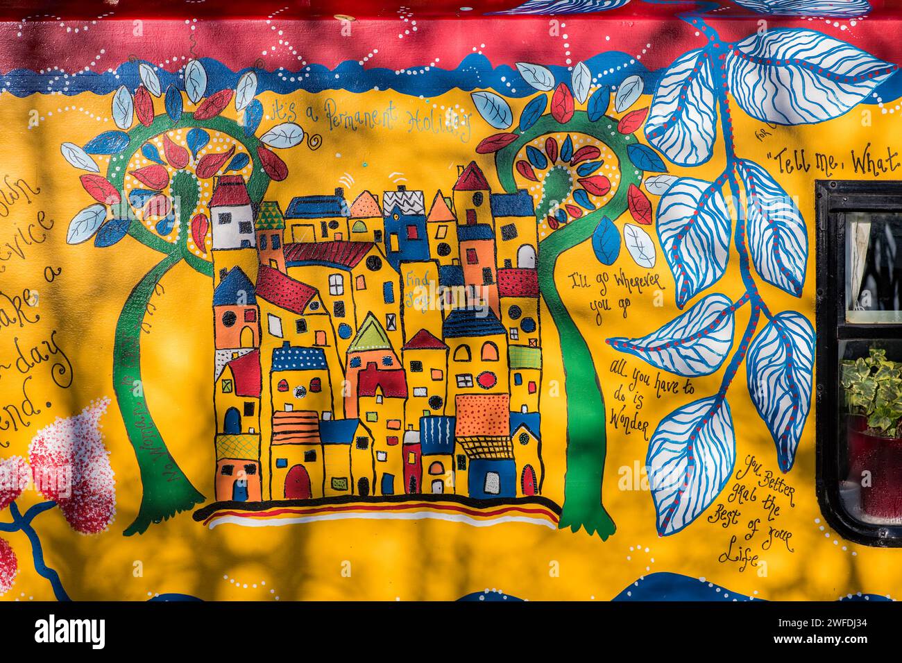 'Tilly Flood' is a colourful narrowboat seen on the Leeds and Liverpool ...