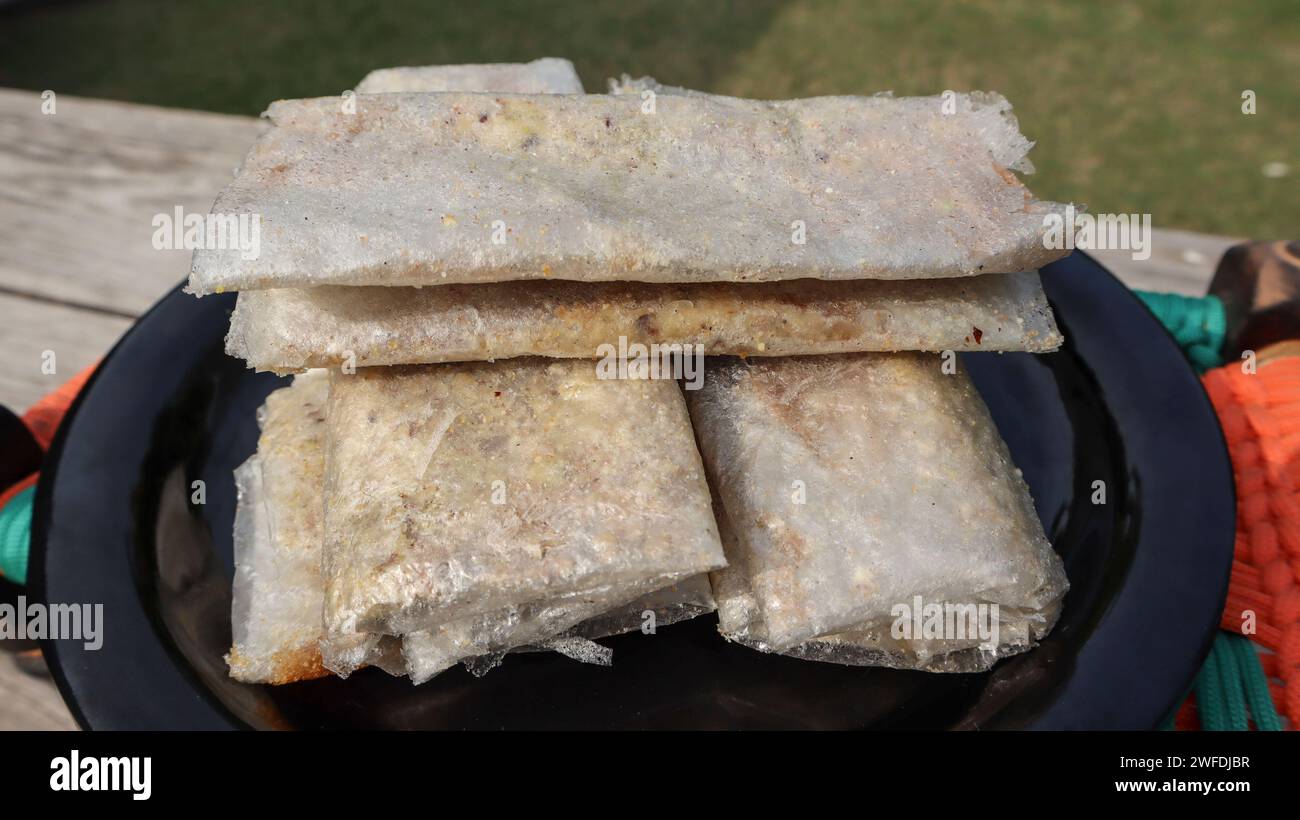 Closeup of Traditional Andhra sweet Pootharekulu made from paper thin ...
