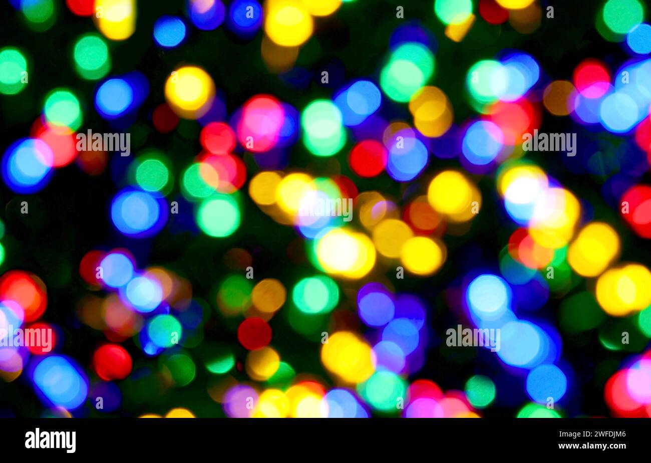 intentionally blurred background of series of illuminated lights of ...