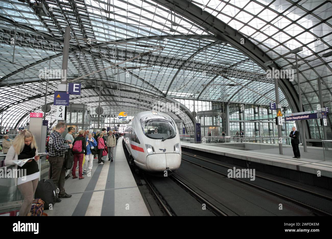 A Deutsch Bahn ICE train arriving at Berlin's Hauptbahnhof with a ...