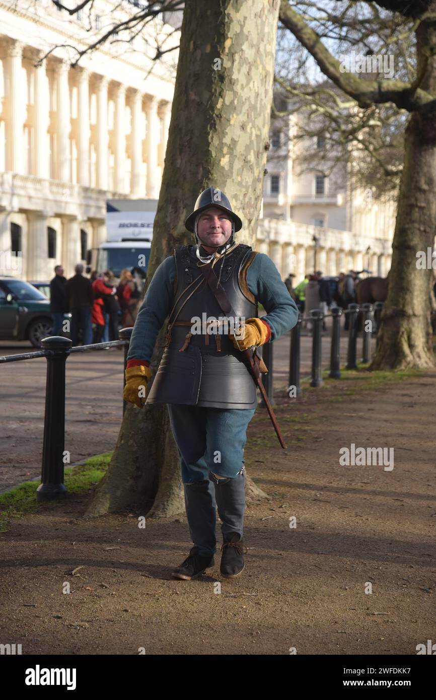 Members of the English Civil War Society march through central London ...