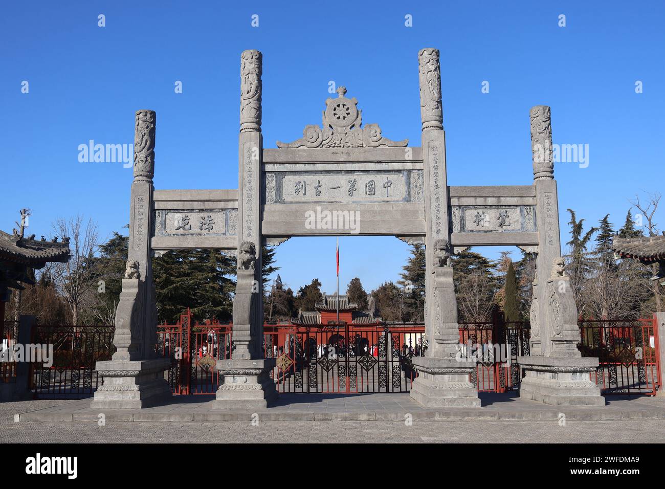 Chinese gate with columns against blue sky Stock Photo - Alamy