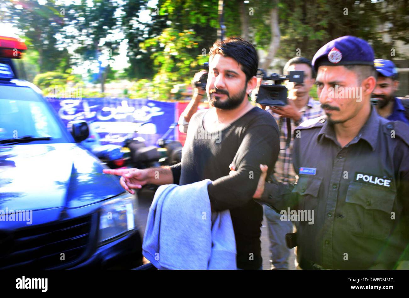 Police officials arrest Tehreek-e-Insaf (PTI) workers after case ...