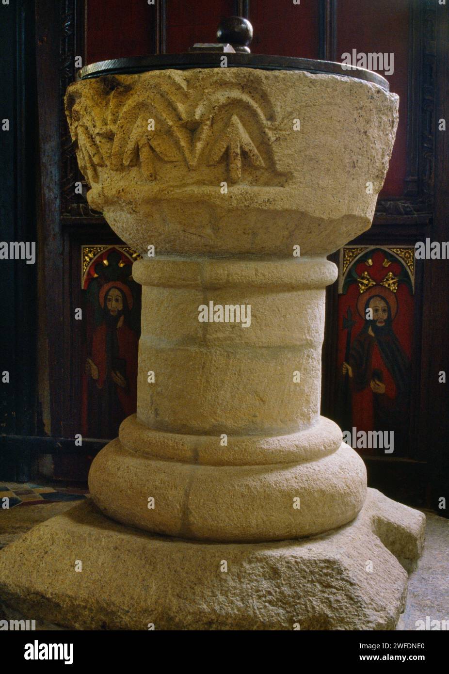 Restored Norman (c 1100) font of Pentewan stone inside St Winwaloe's ...