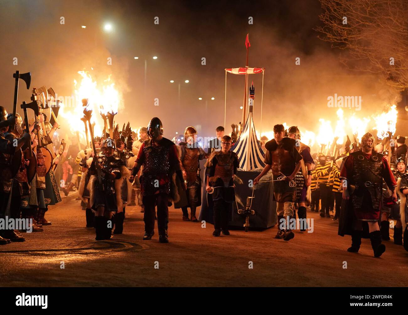 Youngsters take part in the Junior Up Helly Aa in Lerwick on the Shetland Isles during the Up ...