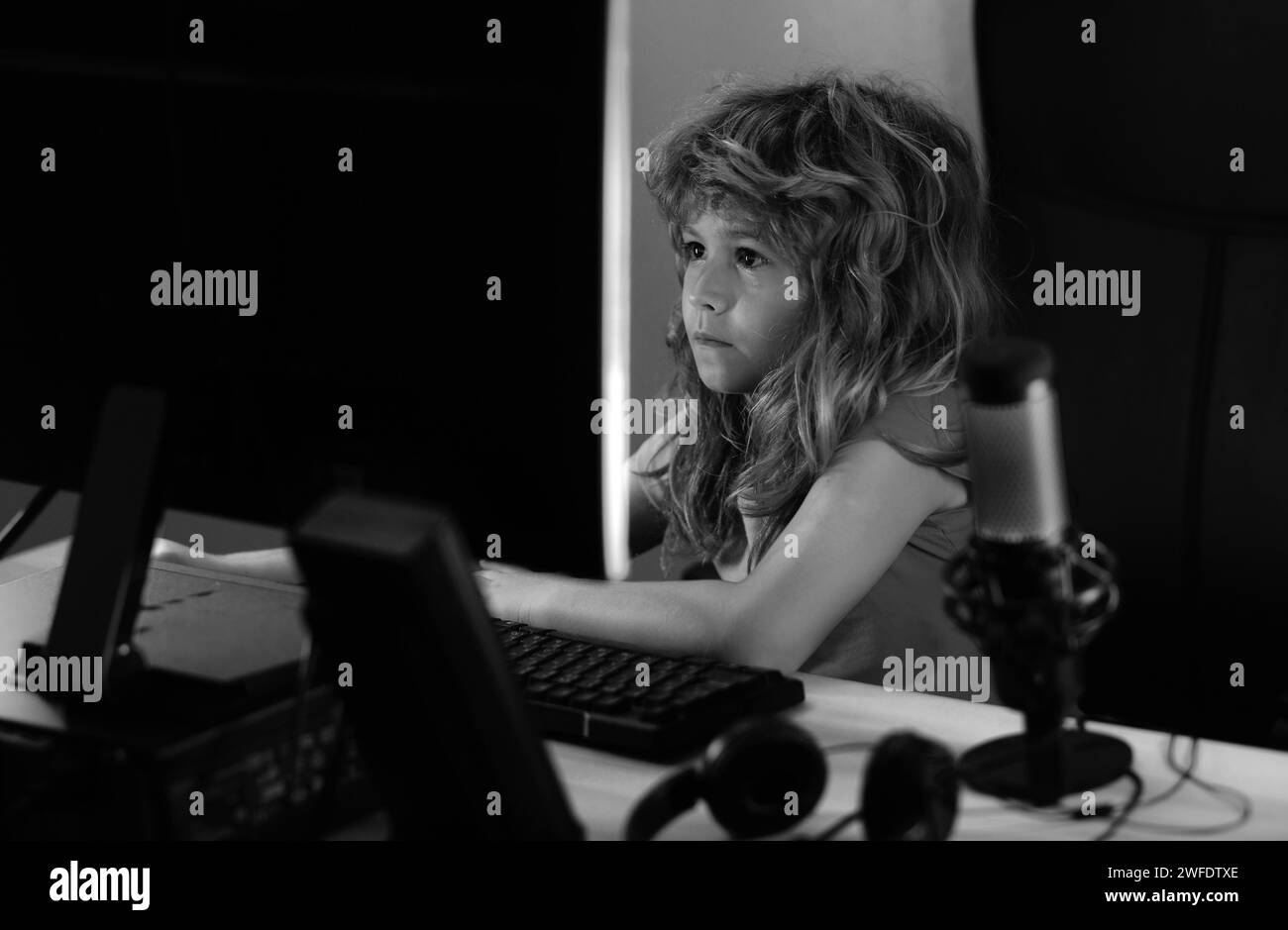 Using computer dark Black and White Stock Photos & Images - Alamy