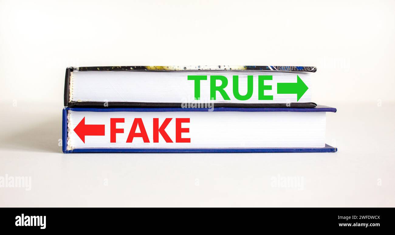True or fake symbol. Concept word True or Fake on beautiful books ...