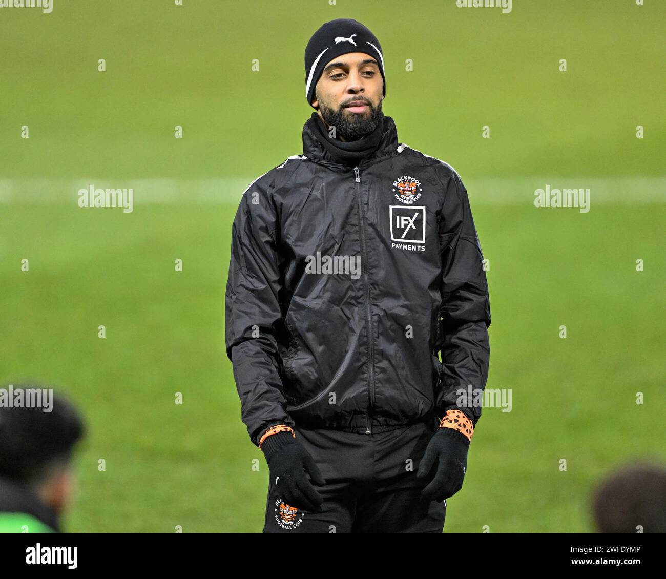 CJ Hamilton of Blackpool warms up ahead of the match, during the ...