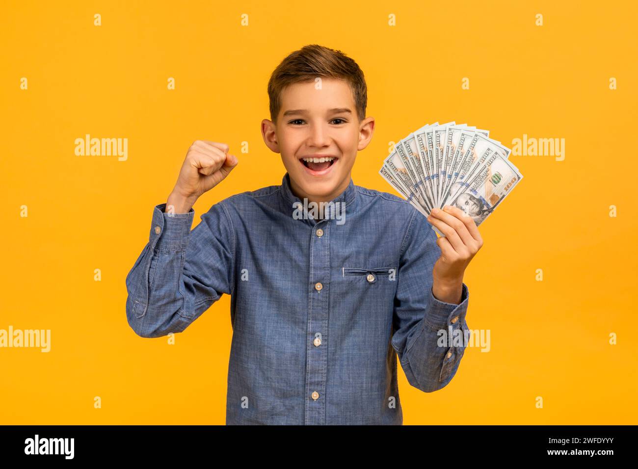 Child holding dollar bills hi-res stock photography and images - Alamy