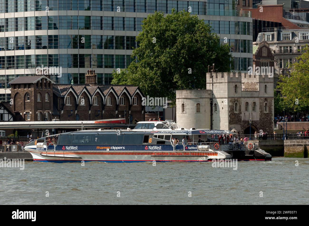 LONDON, UK - JUNE 27, 2010: View of Tower Millennium Pier with Thames ...