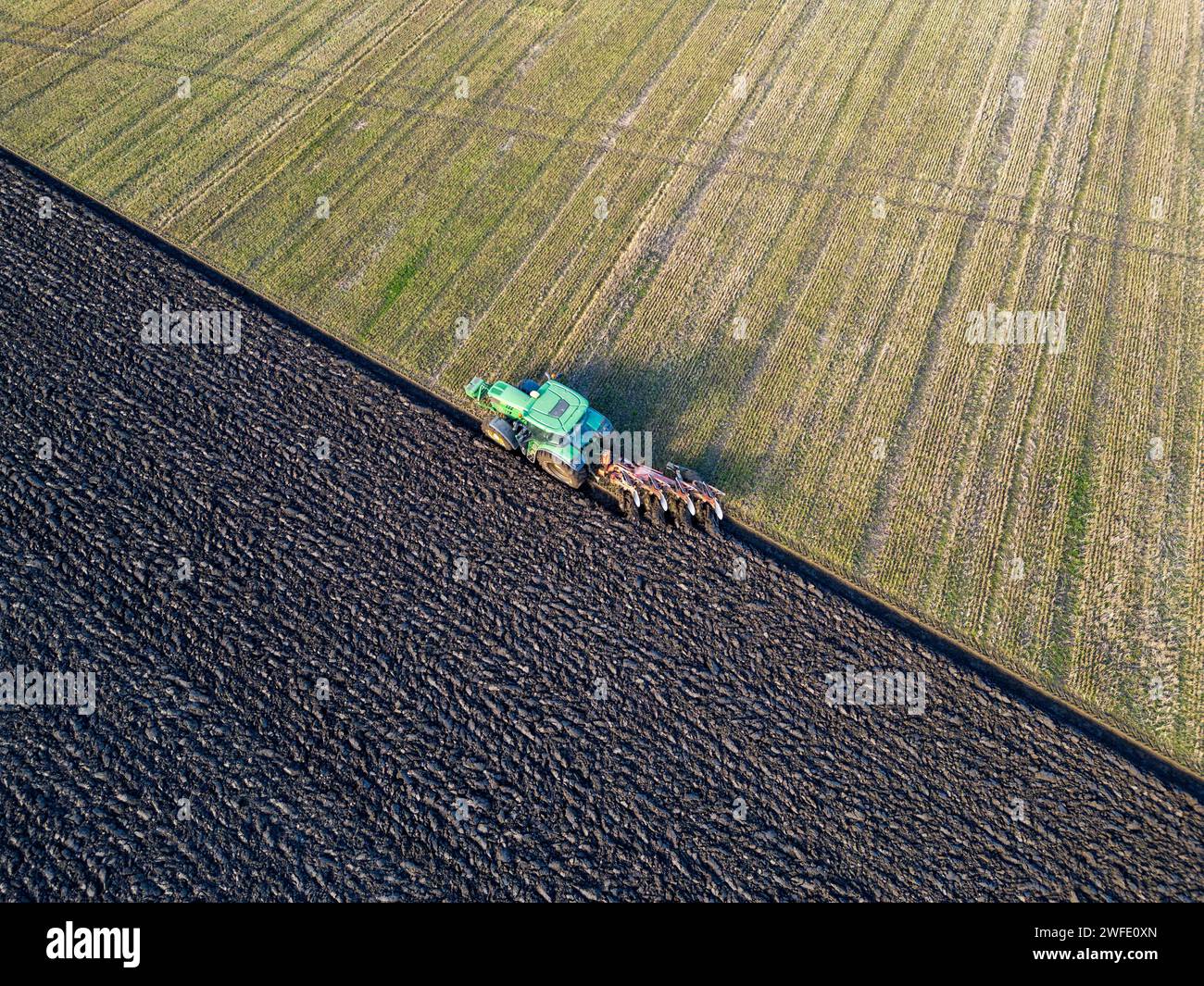 Ploughed field and tractor hi-res stock photography and images - Alamy