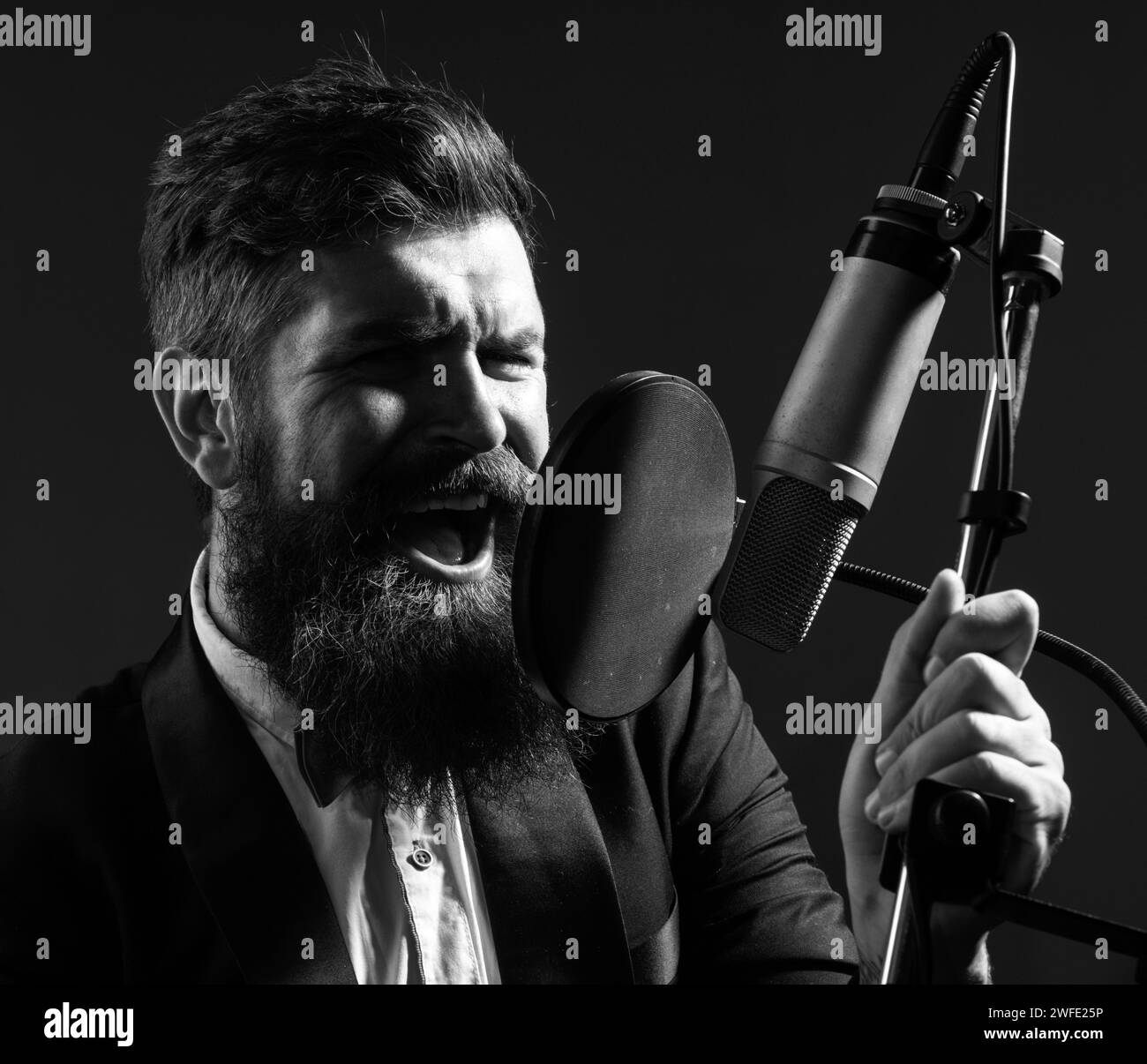 Wearing microphone Black and White Stock Photos & Images - Alamy