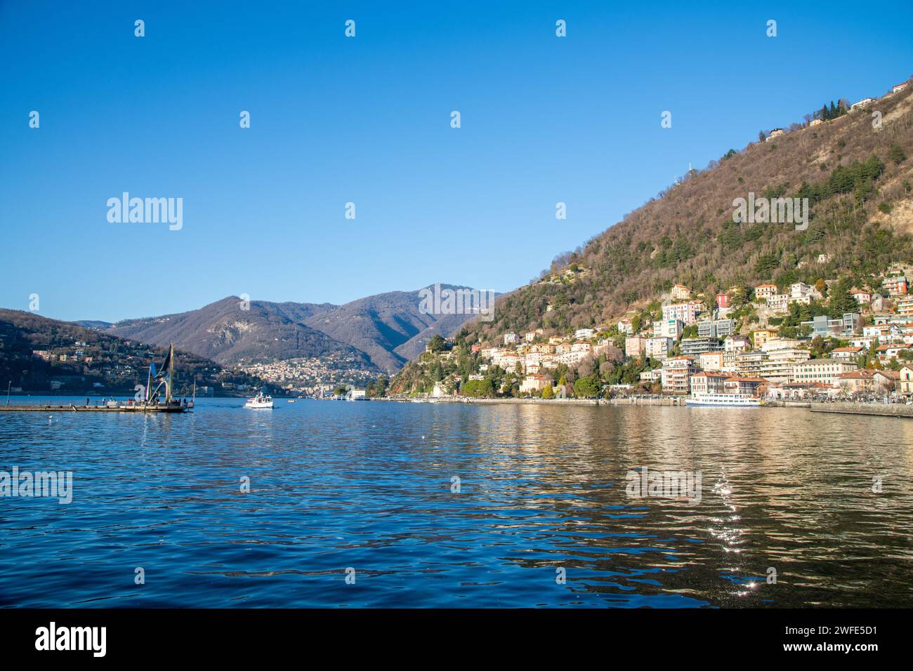 A scenic view of the buildings on the mountainside of Lake Como in in ...