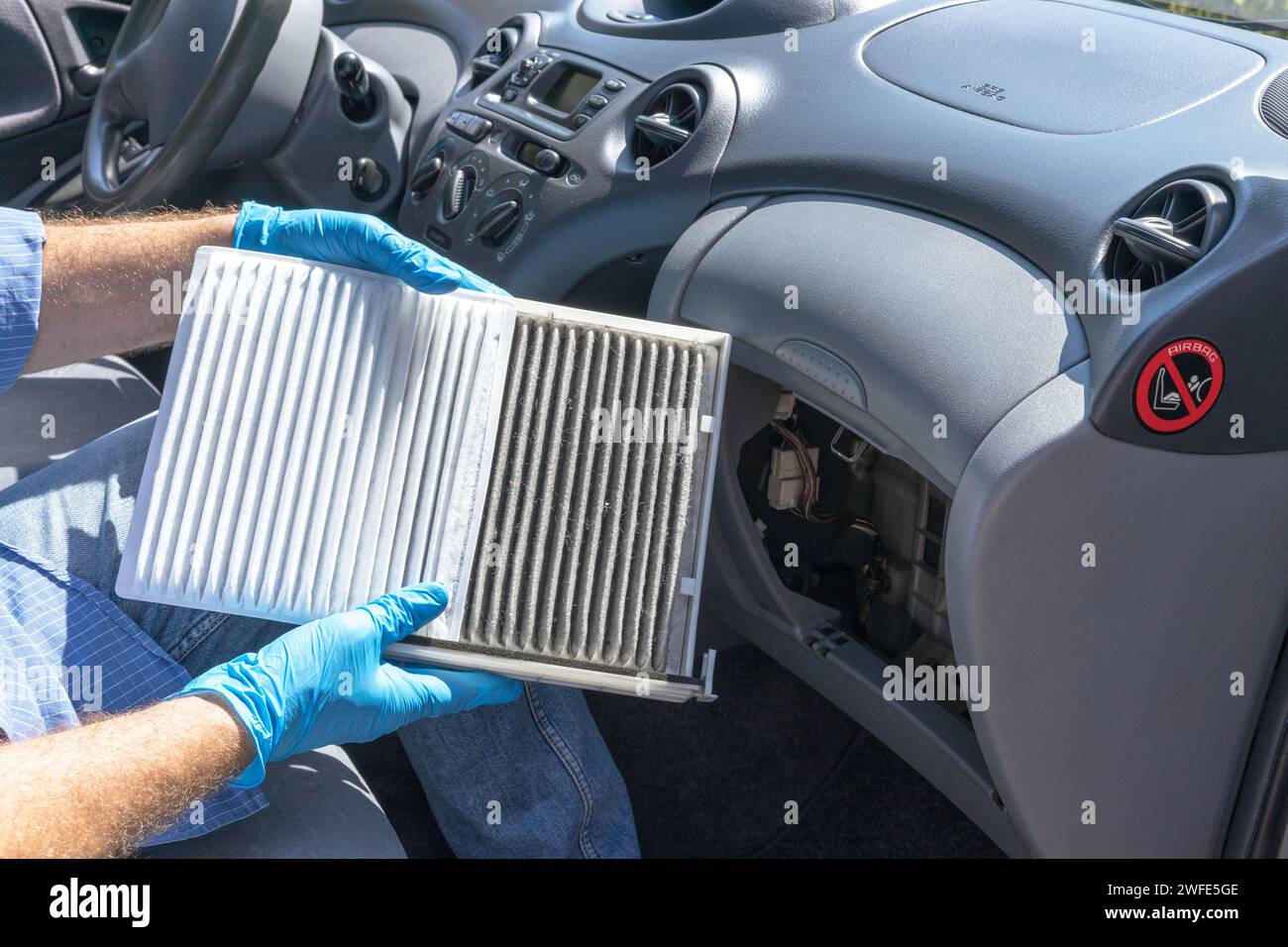 Replacing cabin air conditioner filter hi-res stock photography and ...