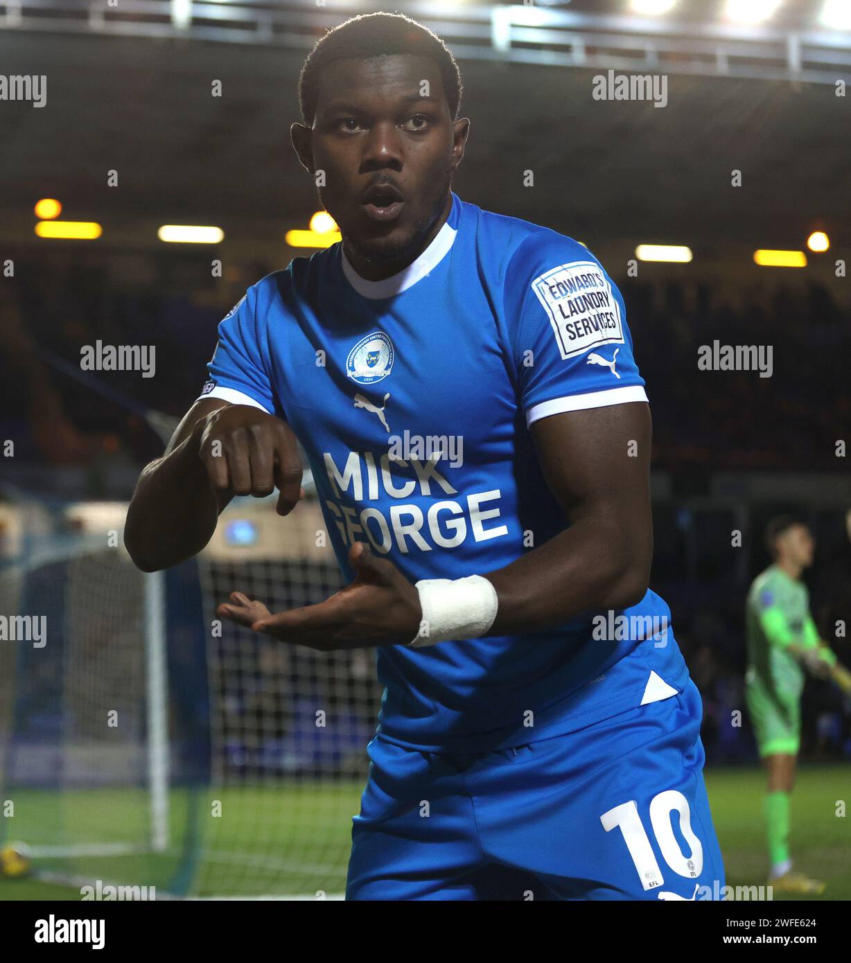 Peterborough, UK. 30th Jan, 2024. Ephron Mason-Clark (PU) celebrates ...