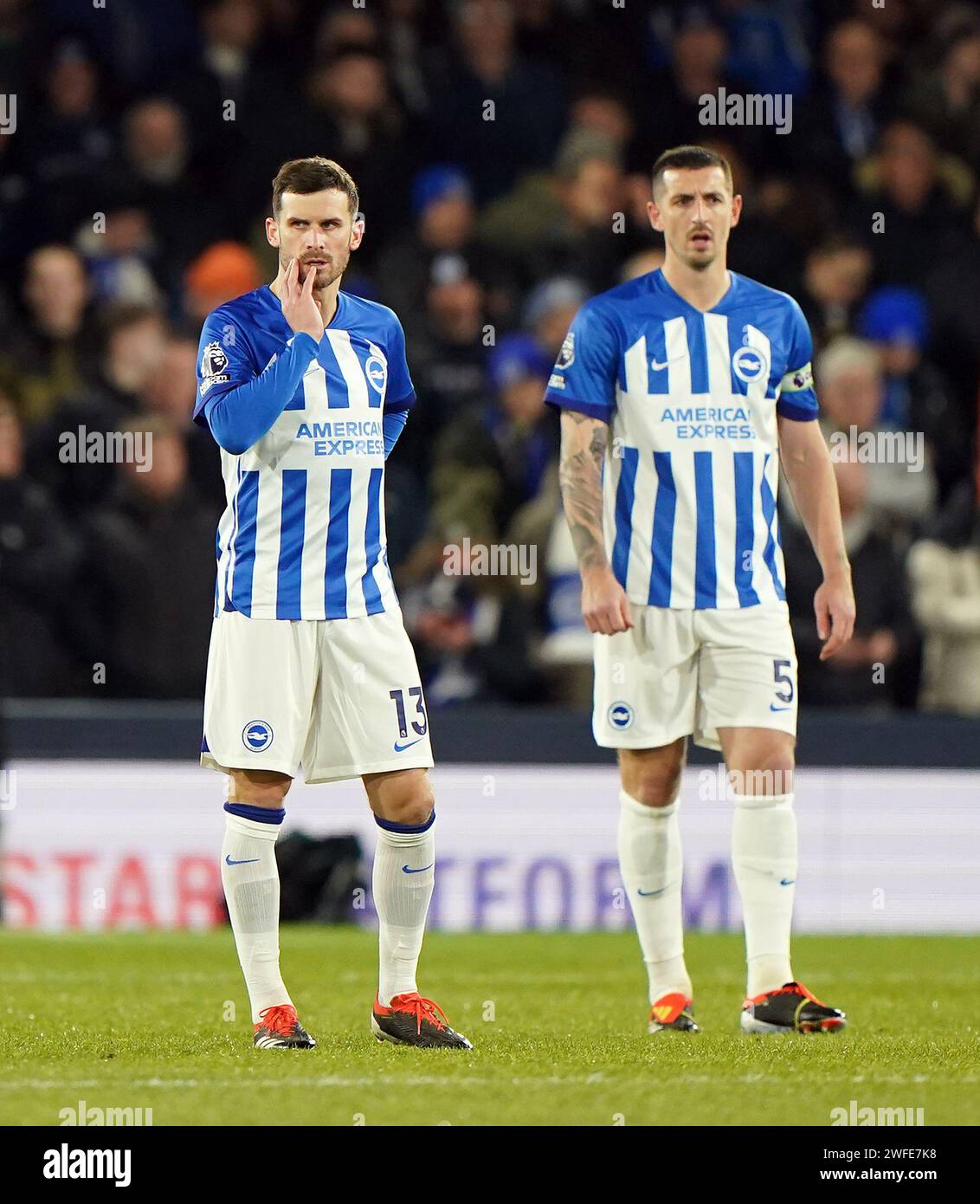 Brighton and Hove Albion's Pascal Gross and Lewis Dunk (right) react ...